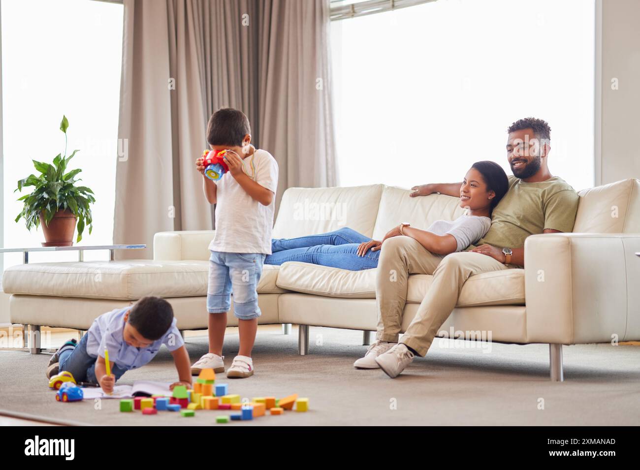 Parents watching kids blocks hi-res stock photography and images - Alamy