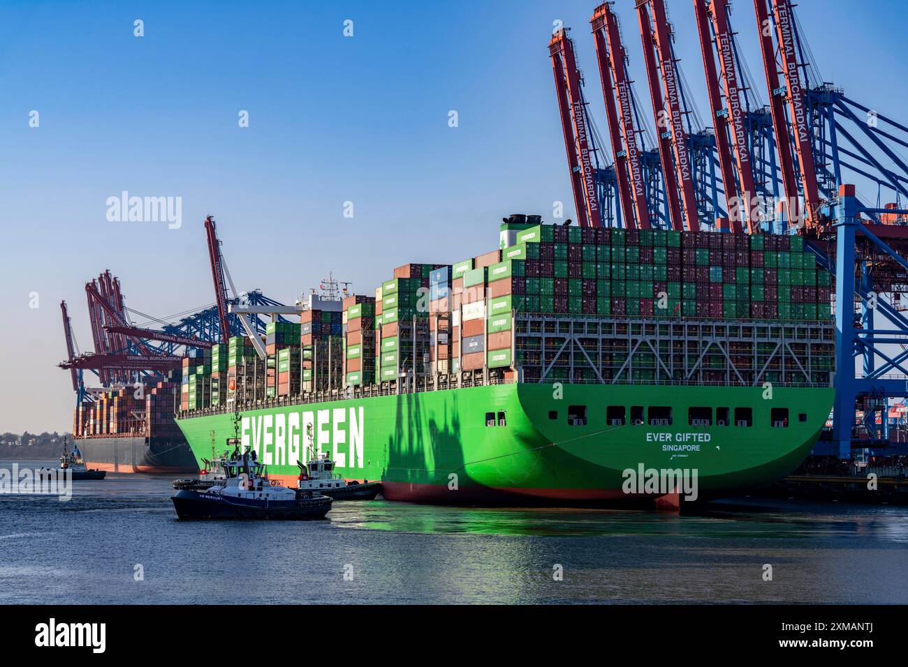 Container ship Ever Gifted, arriving at the port of Hamburg ...