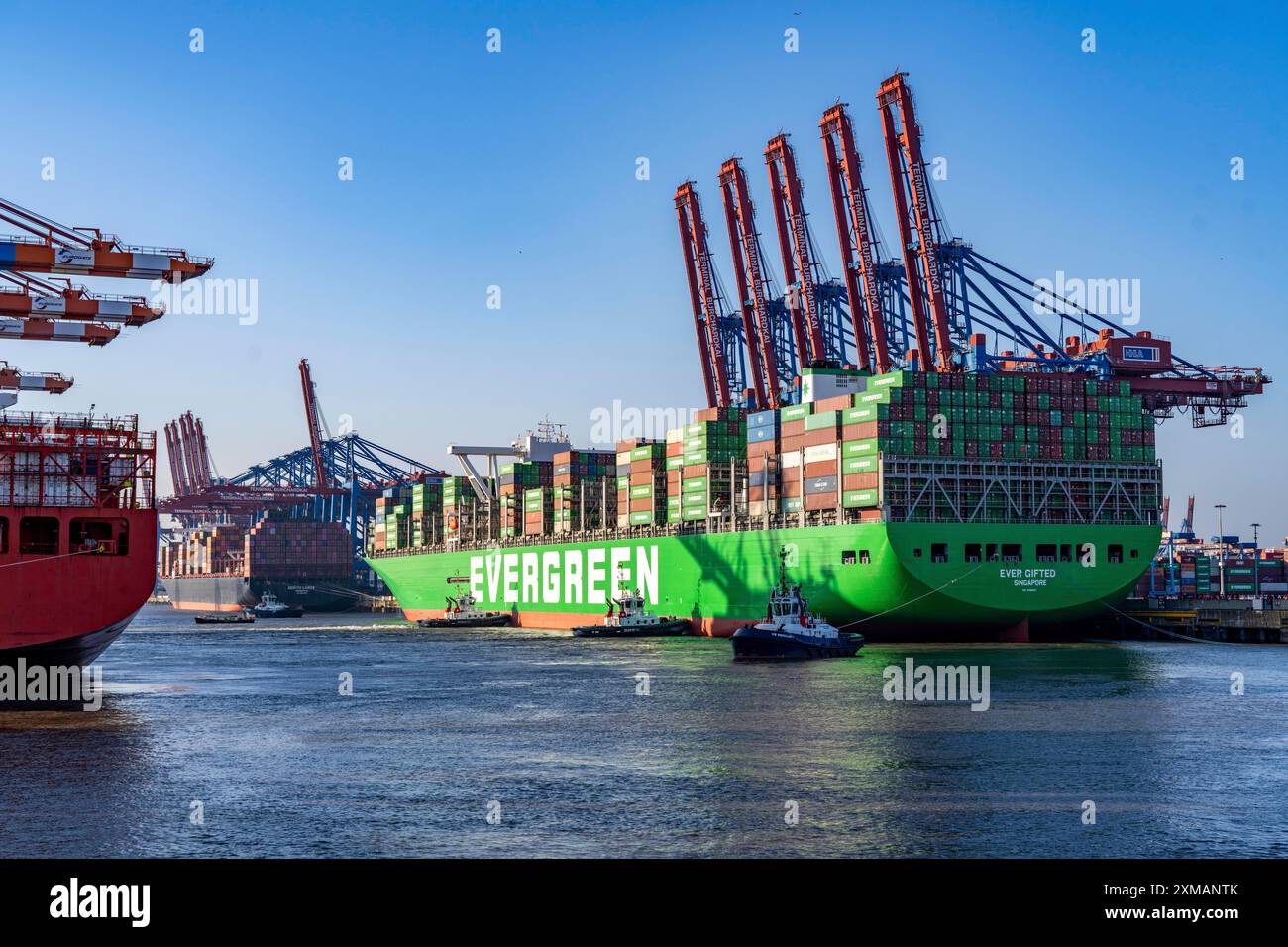 Container ship Ever Gifted, arriving at the port of Hamburg ...