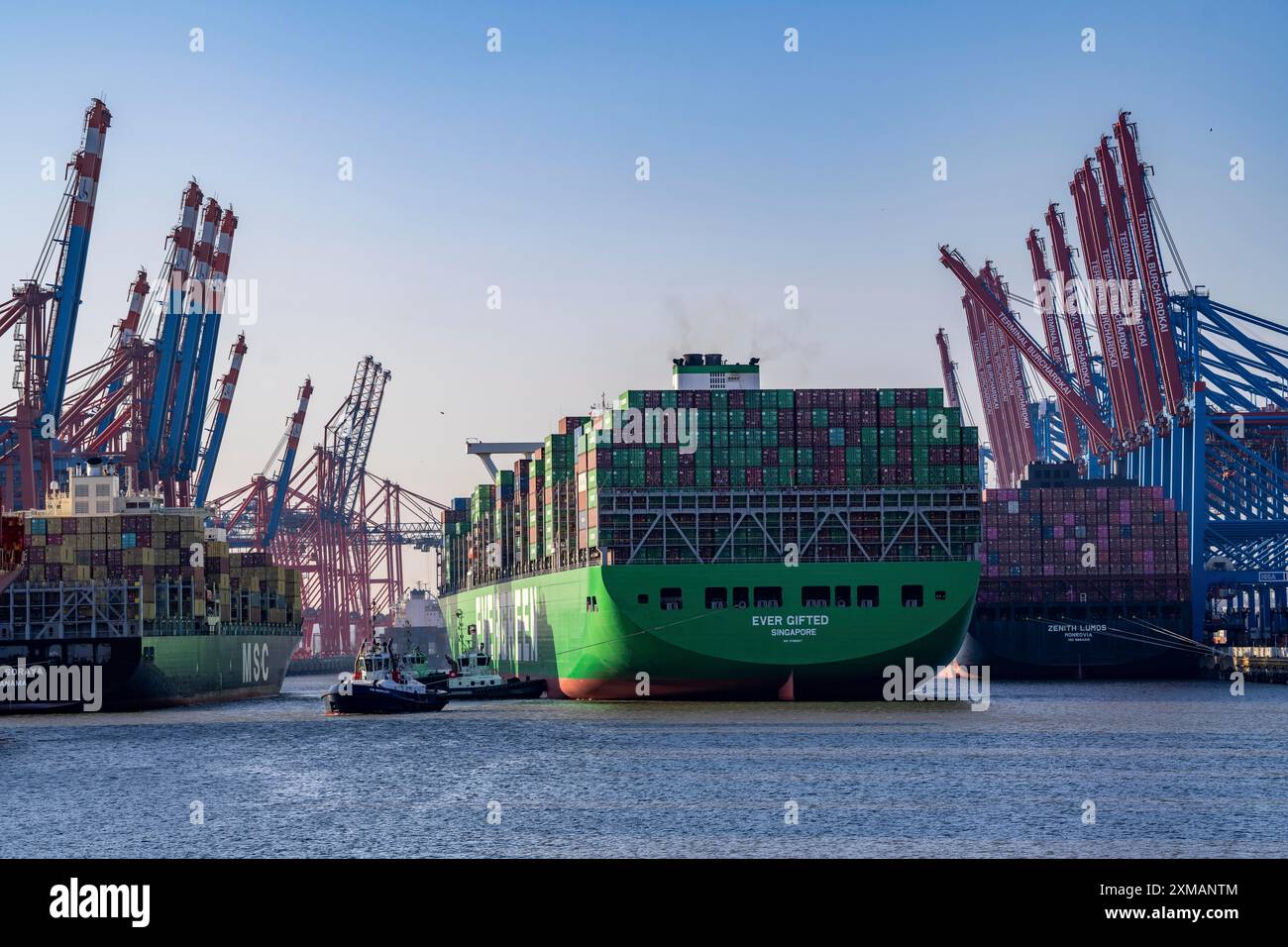 Container ship Ever Gifted, arriving at the port of Hamburg ...