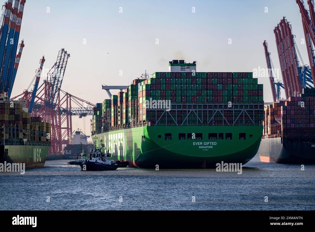 Container ship Ever Gifted, arriving at the port of Hamburg ...
