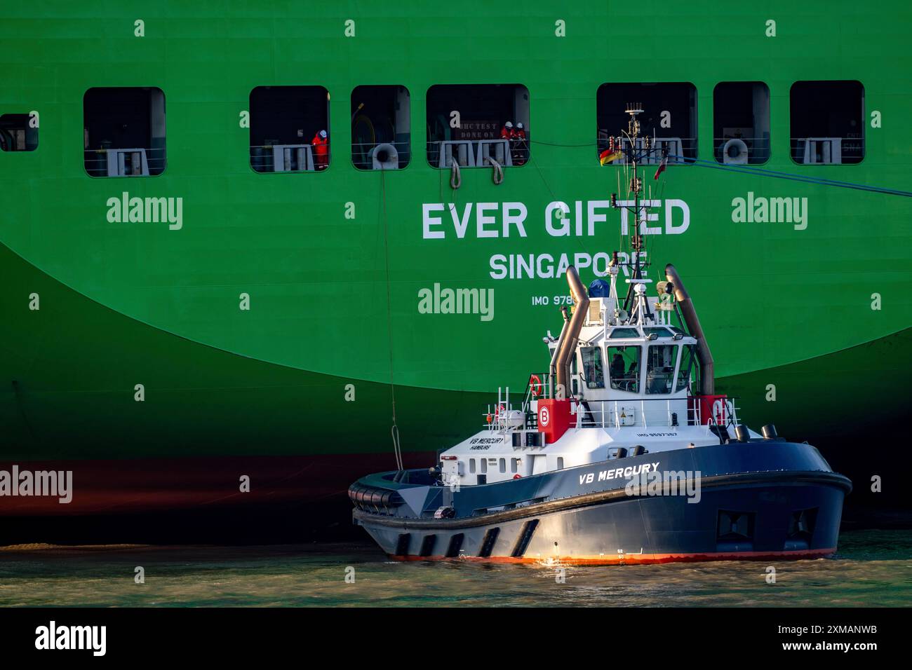 Container ship Ever Gifted, arriving at the port of Hamburg ...
