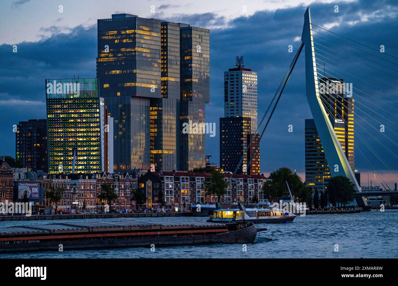 The skyline of Rotterdam, with the Erasmus Bridge over the Nieuwe Maas ...