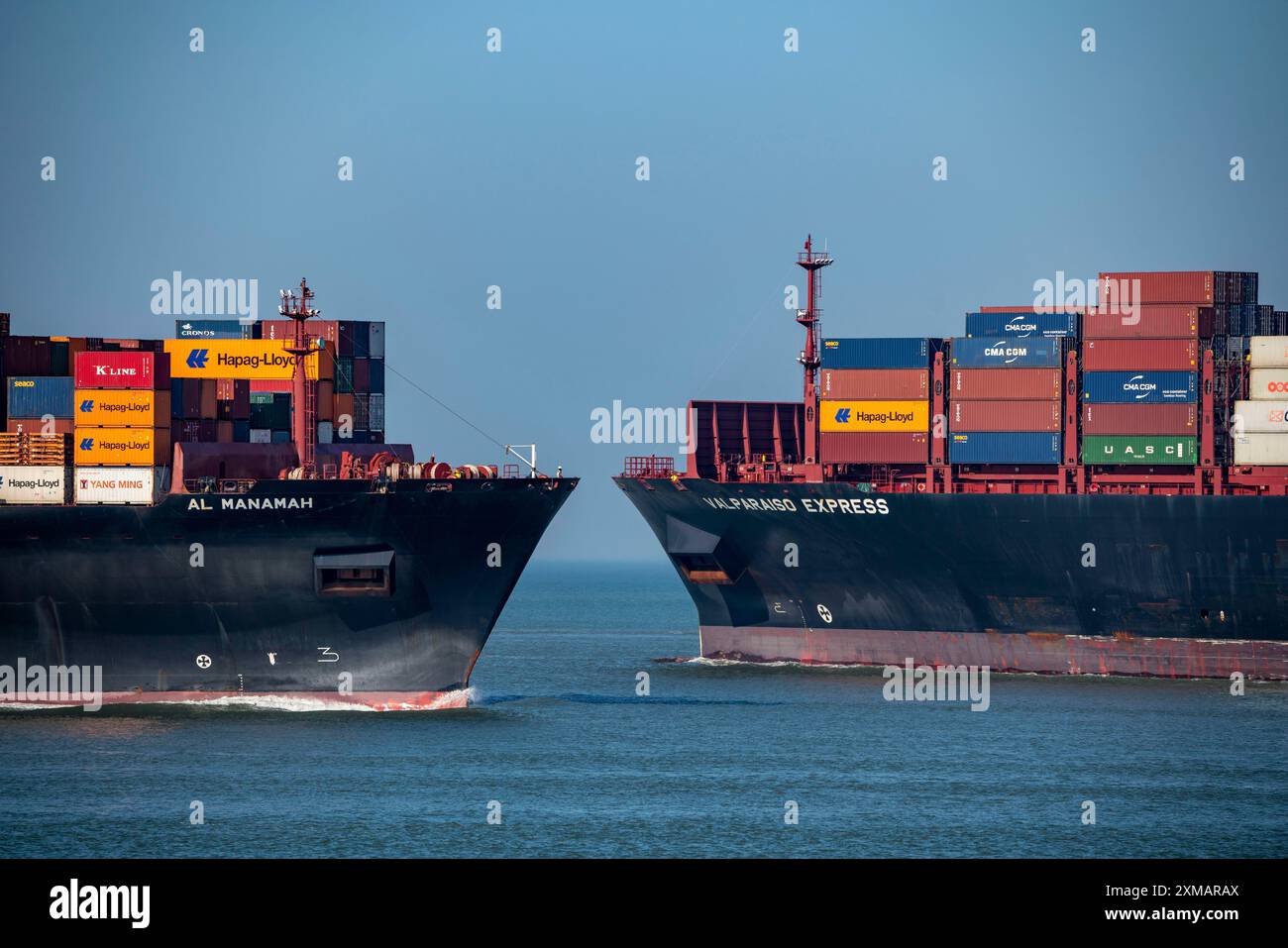 Container freighter Al Manamah, owned by Hapag-Lloyd, and VALPARAISO ...
