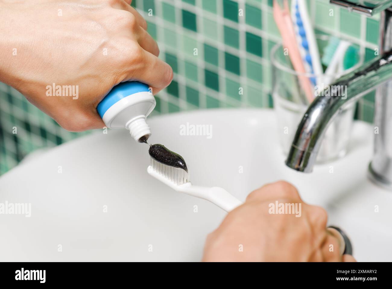 Black person toothpaste hi-res stock photography and images - Alamy