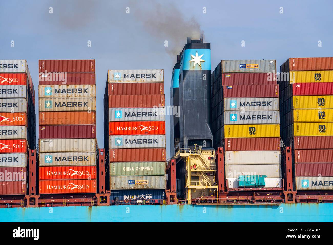 Container freighter Madison Maersk smoking chimneys of the ship's ...