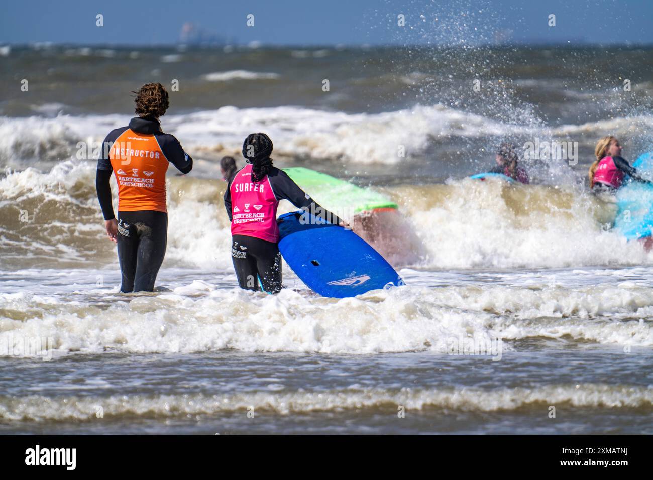 Course for surfers, surfing beginners, on the beach of Scheveningen ...