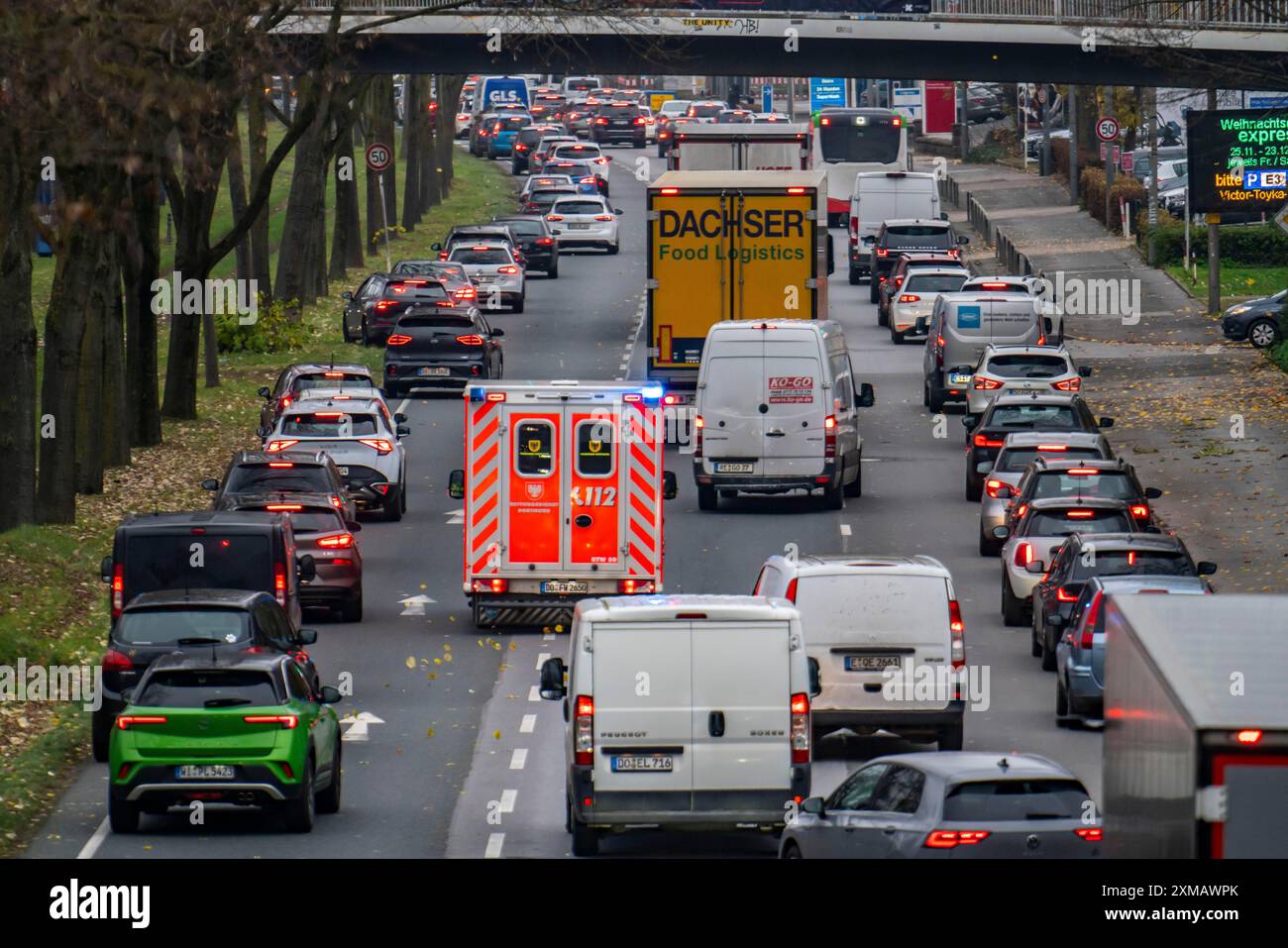 Rescue lane, ambulance making its way through city centre traffic with ...