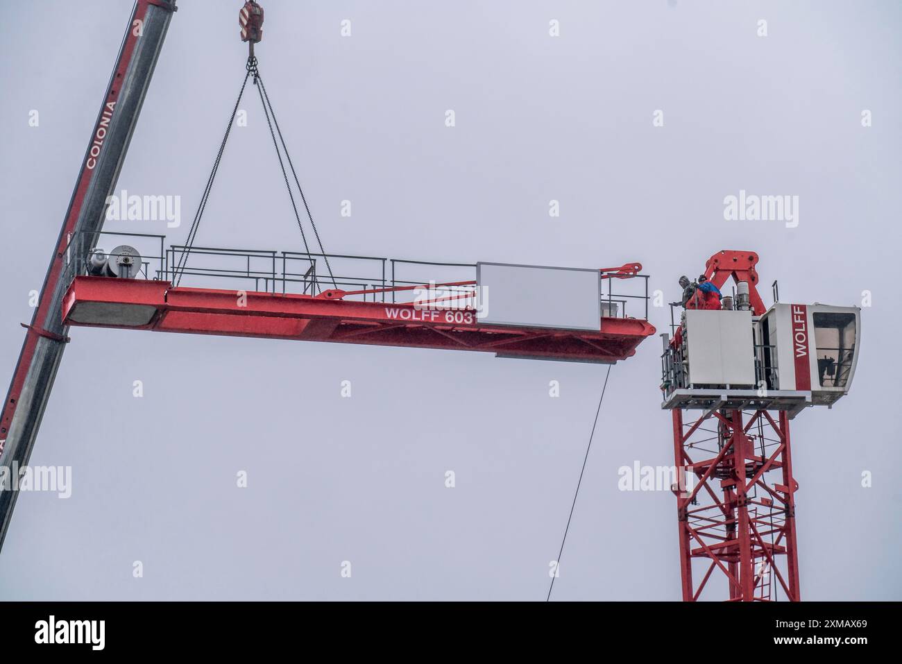 Dismantling of a large construction crane, on a large construction site ...