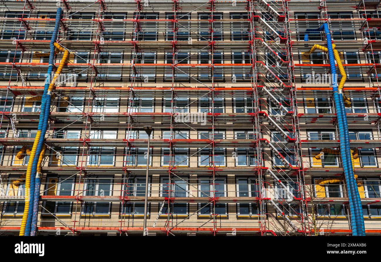 Large construction site, scaffolded shell of an office building complex ...