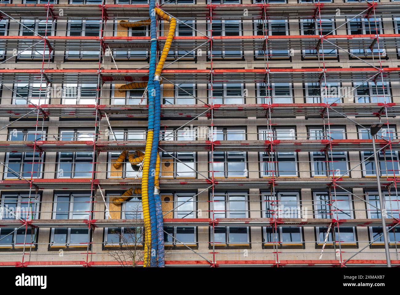 Large construction site, scaffolded shell of an office building complex ...