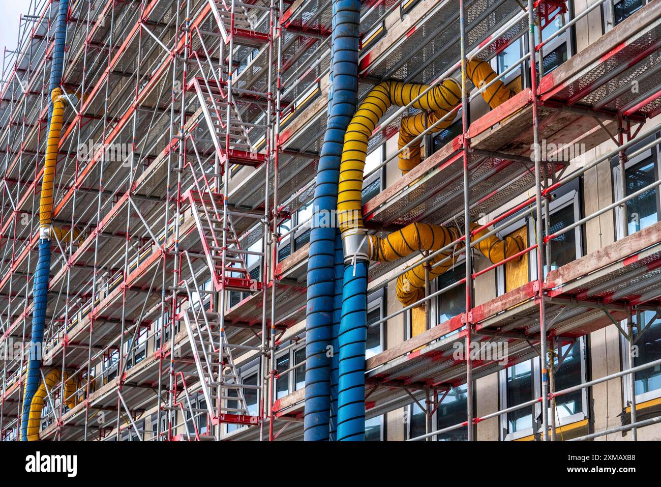 Large construction site, scaffolded shell of an office building complex ...