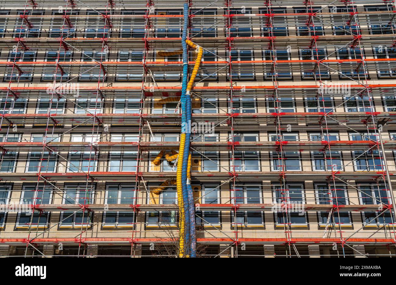 Large construction site, scaffolded shell of an office building complex ...