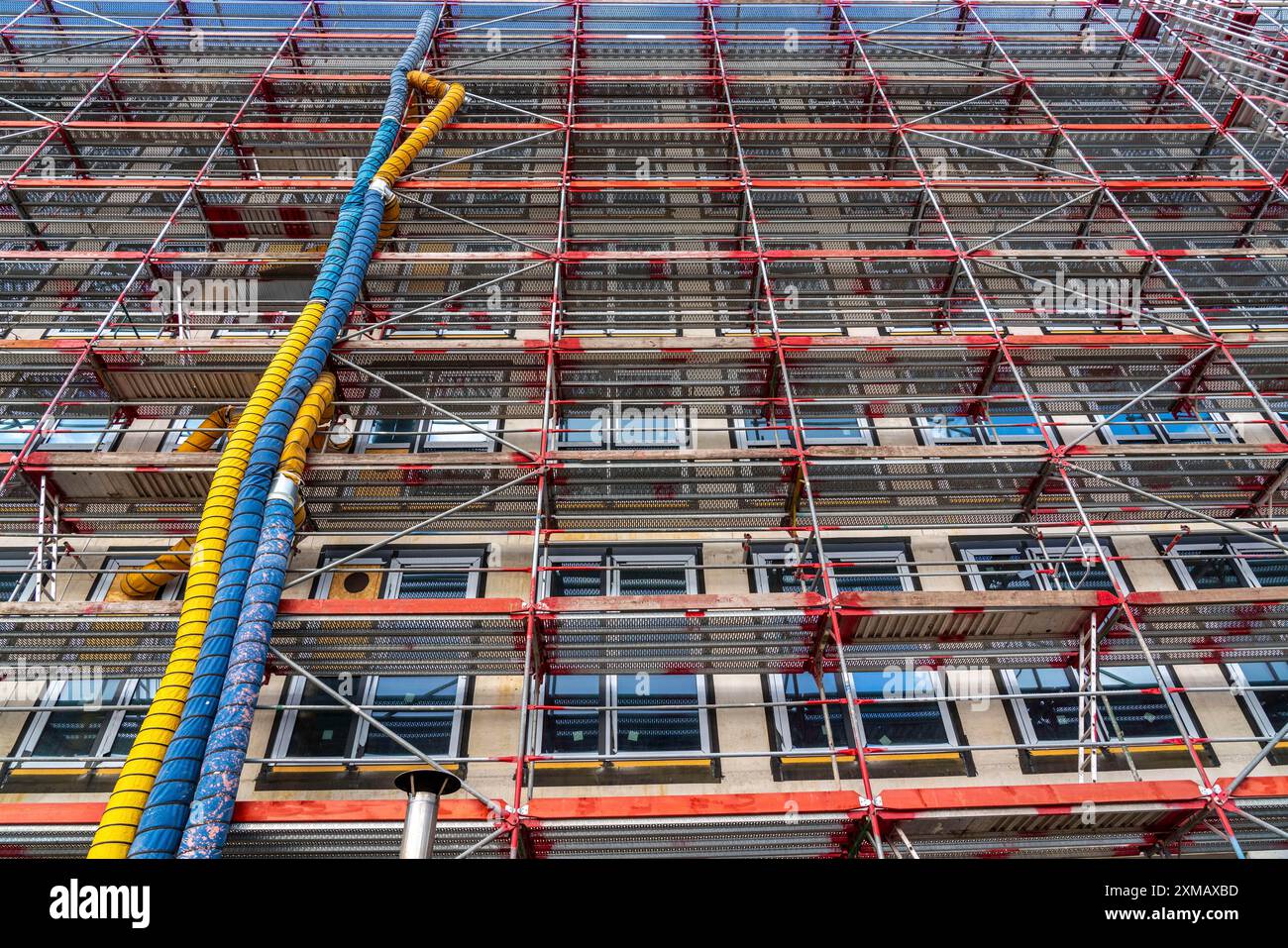 Large construction site, scaffolded shell of an office building complex ...