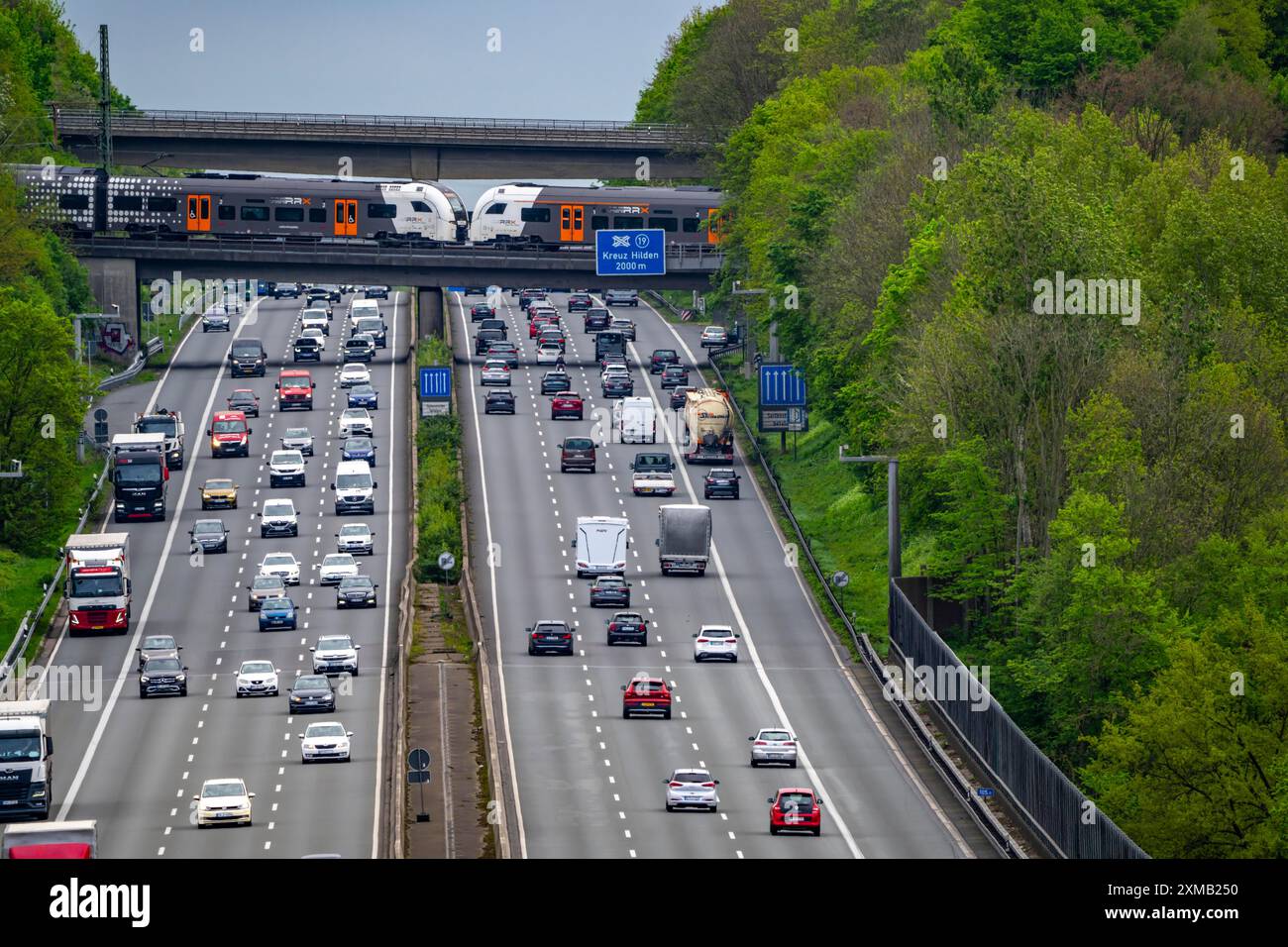 Rhein-Ruhr-Express, RRX train, crossing the A3 motorway, traffic on 8 ...