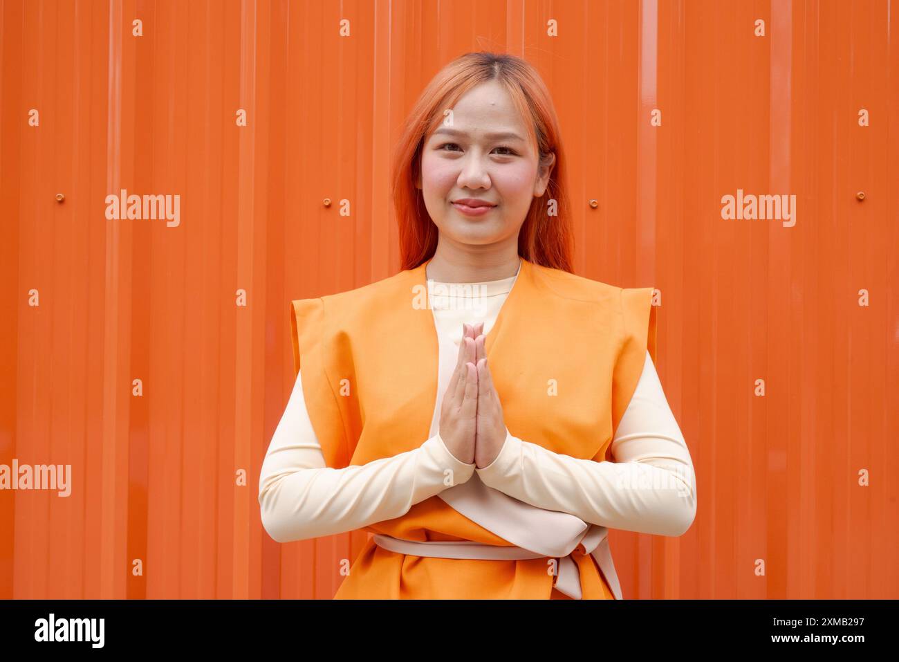 Beautiful Thai Woman Making Traditional Wai Sawasdee Greeting Against ...