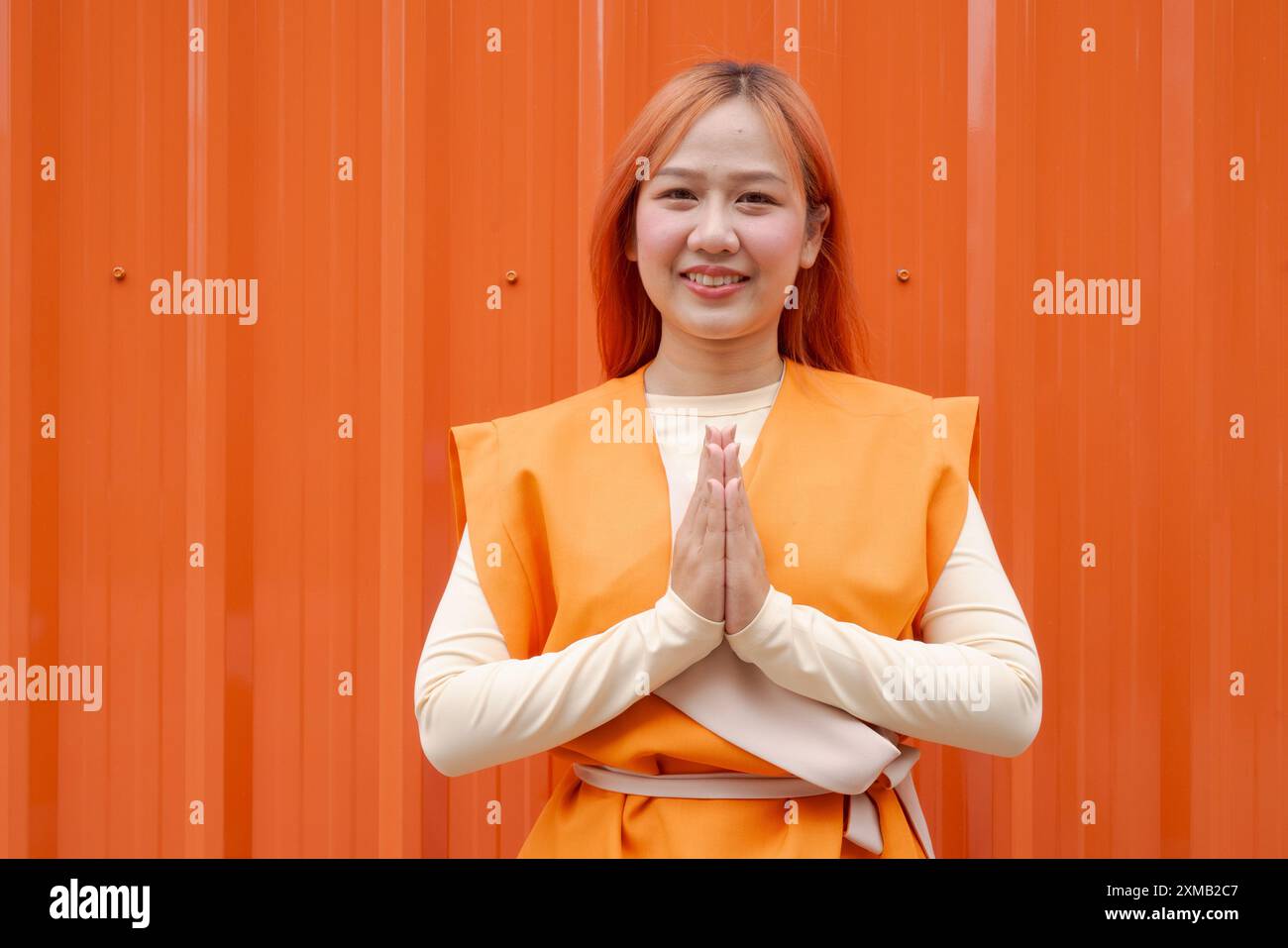 Beautiful Thai Woman Making Traditional Wai Sawasdee Greeting Against ...