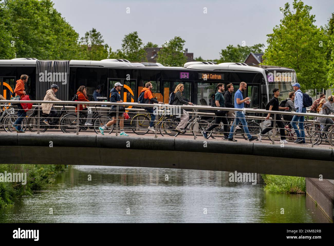 Central cycle path on the Vredenburgviaduct, public transport bus, at ...