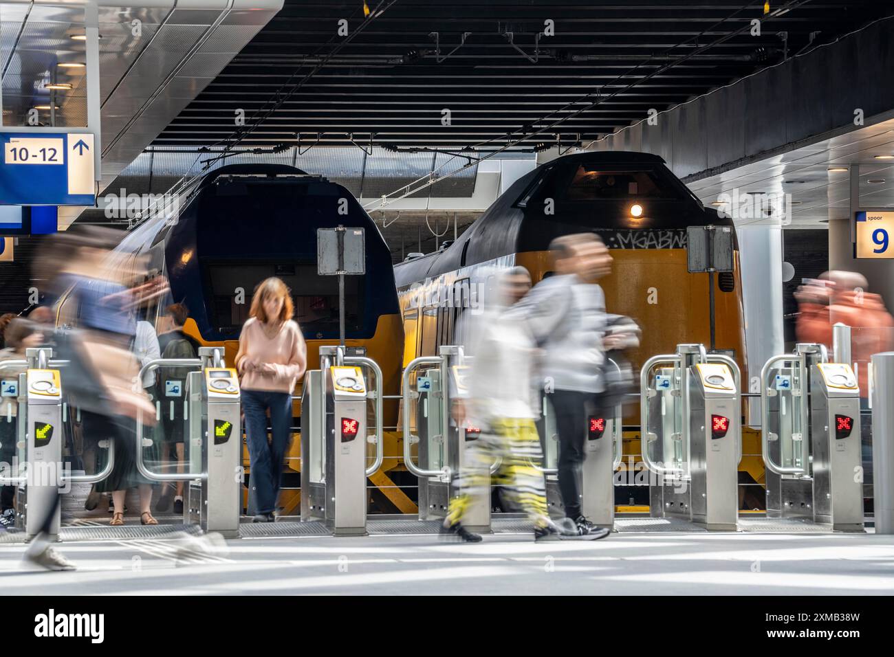 Station concourse, automatic entrance and ticket control in front of ...