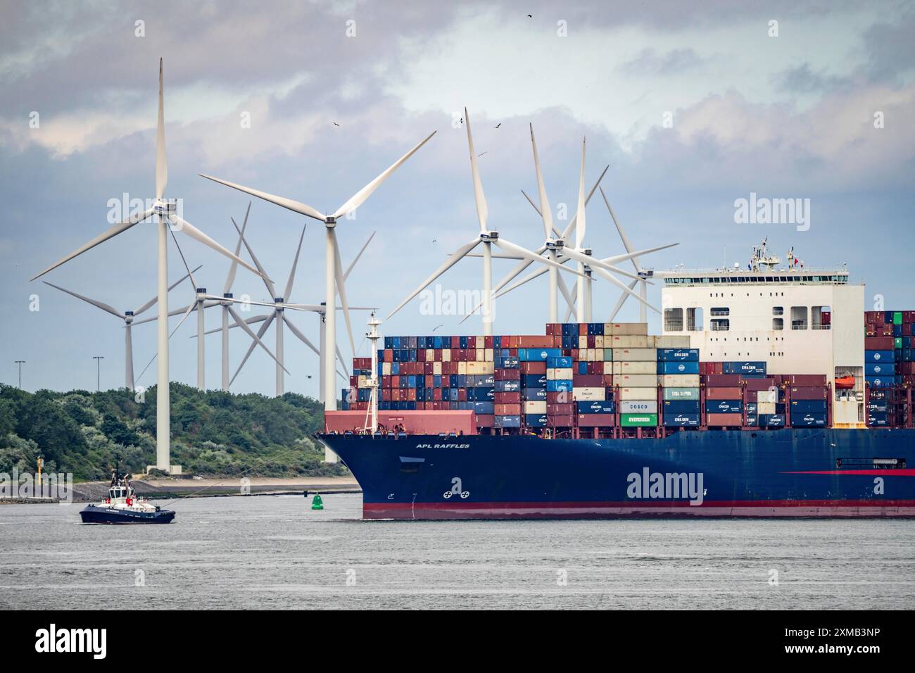 Entrance to the seaport of Rotterdam, APL Raffles container freighter ...