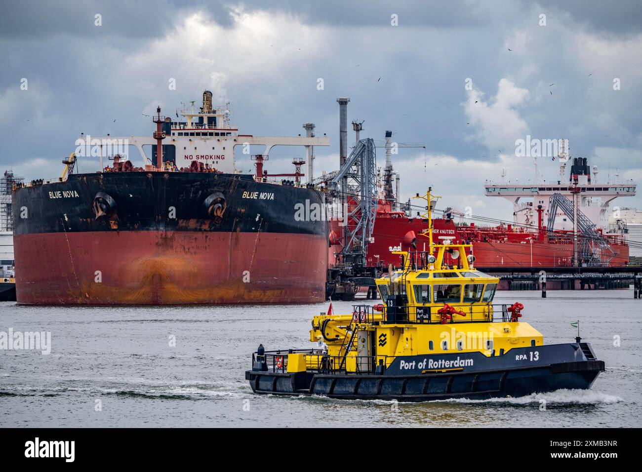 Large tanker for crude oil, Blue Nova, being unloaded, inland waterway ...