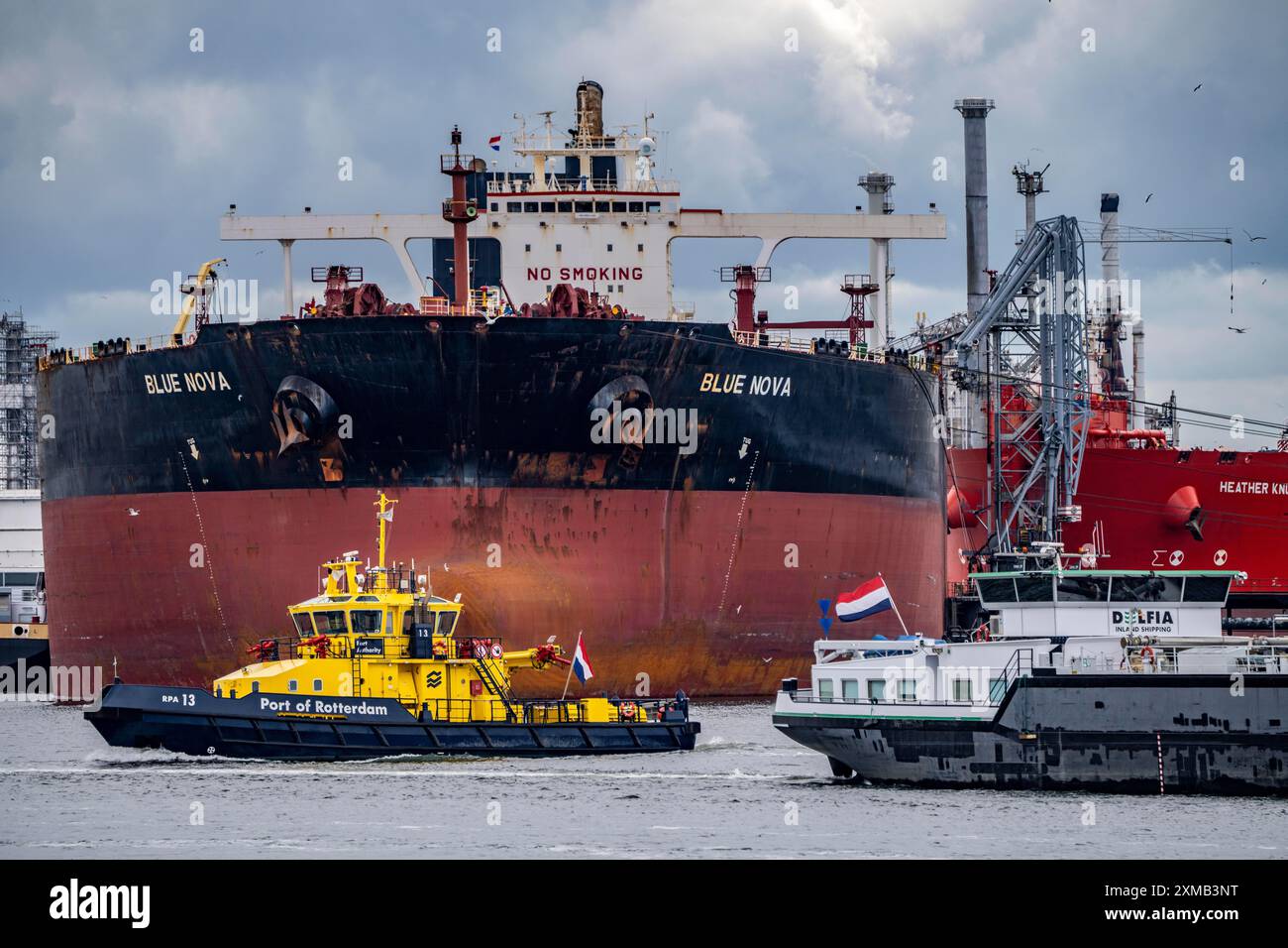 Large tanker for crude oil, Blue Nova, being unloaded, inland waterway ...
