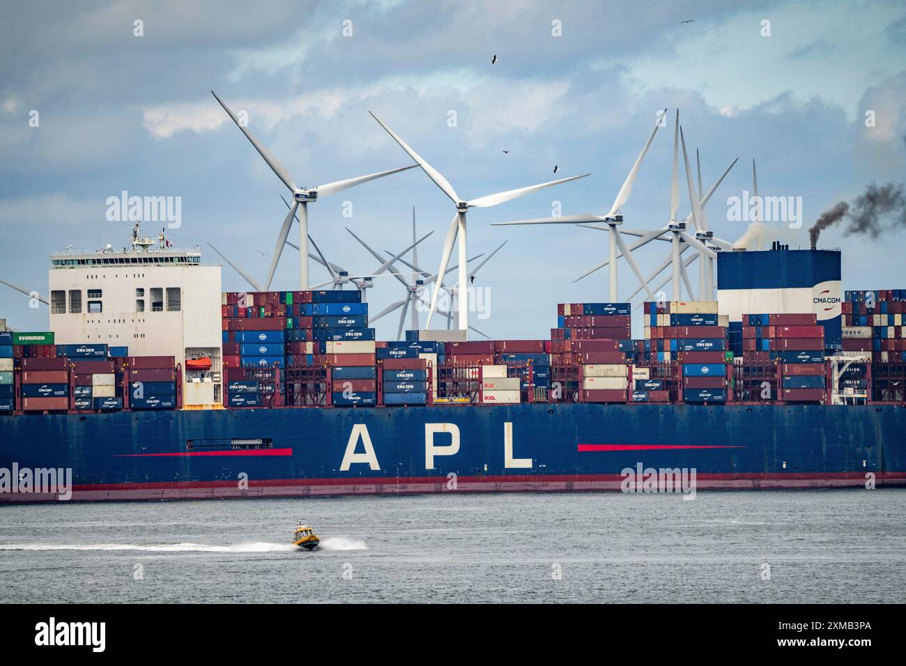 Entrance to the seaport of Rotterdam, APL Raffles container freighter ...