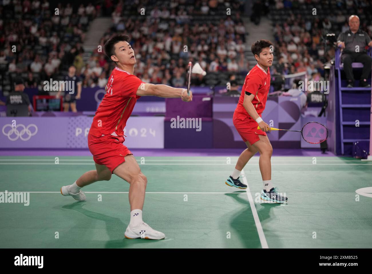 China's Feng Yan Zhe, left, and Huang Dong Ping play against United ...