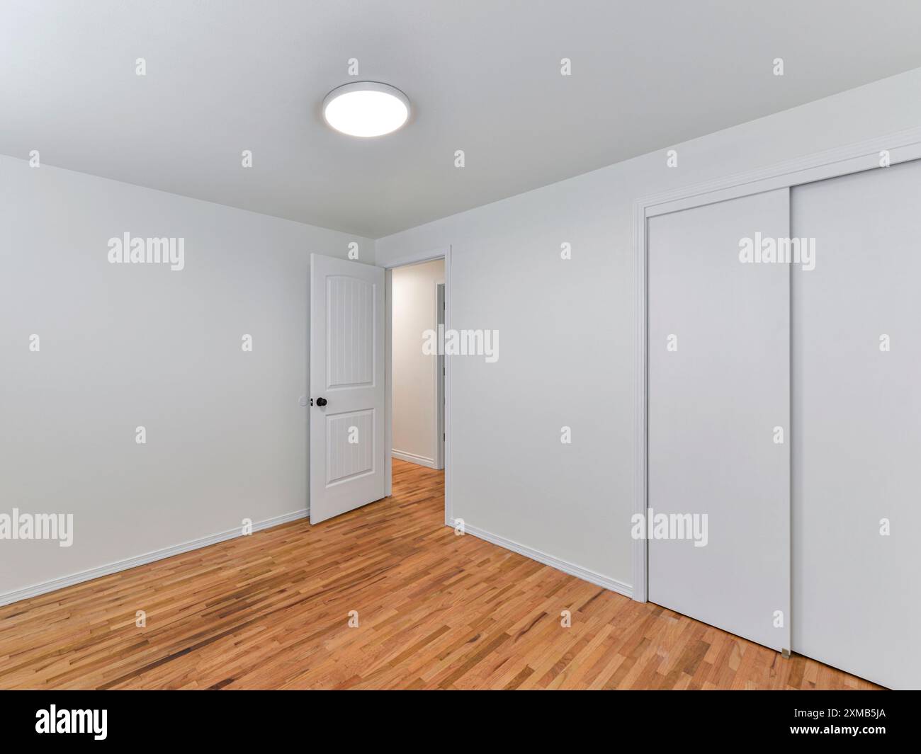Modern residential empty bedroom interior Stock Photo - Alamy