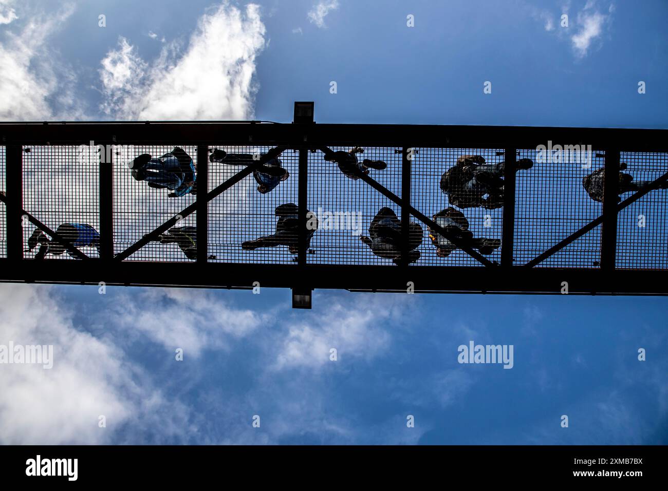 Lattice walkway, people walk over a walkway at a height of a good 15 ...