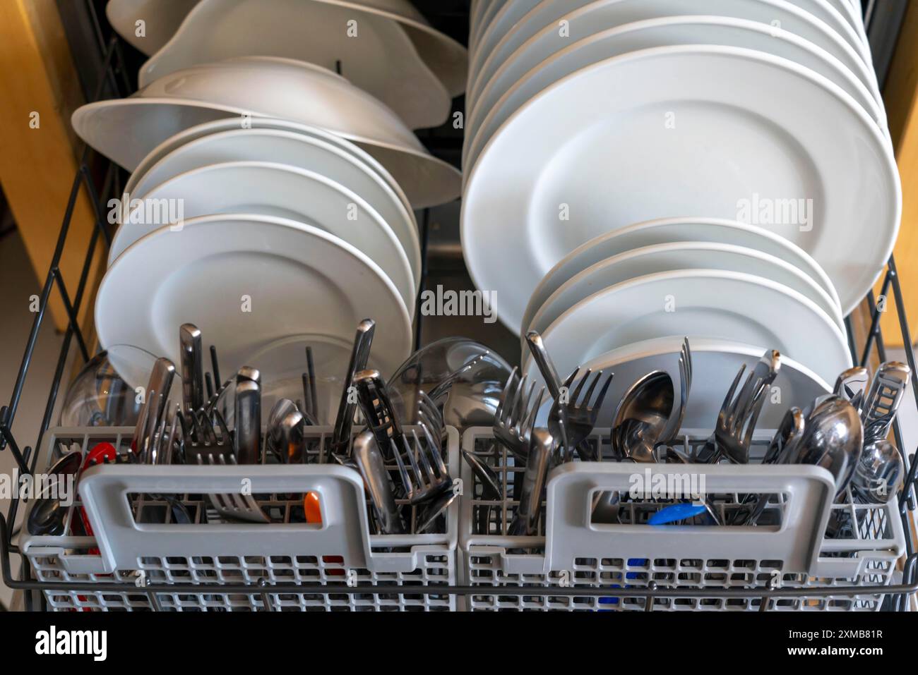 Dishwasher, full of clean crockery Stock Photo - Alamy