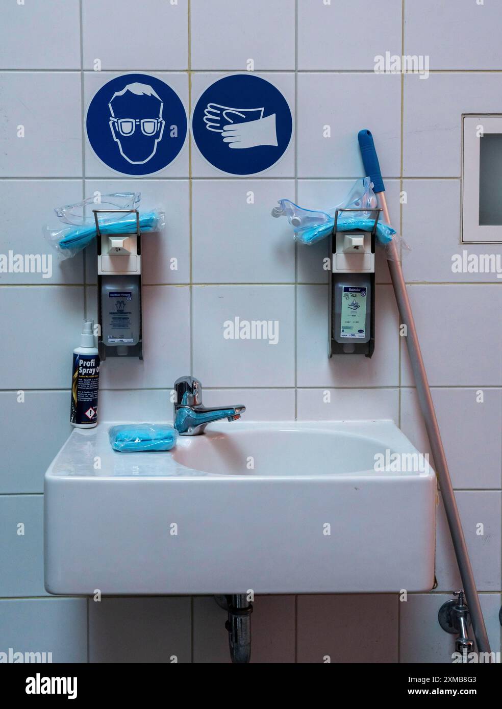 Washroom for workers in a company, hygiene measures, liquid soap and ...