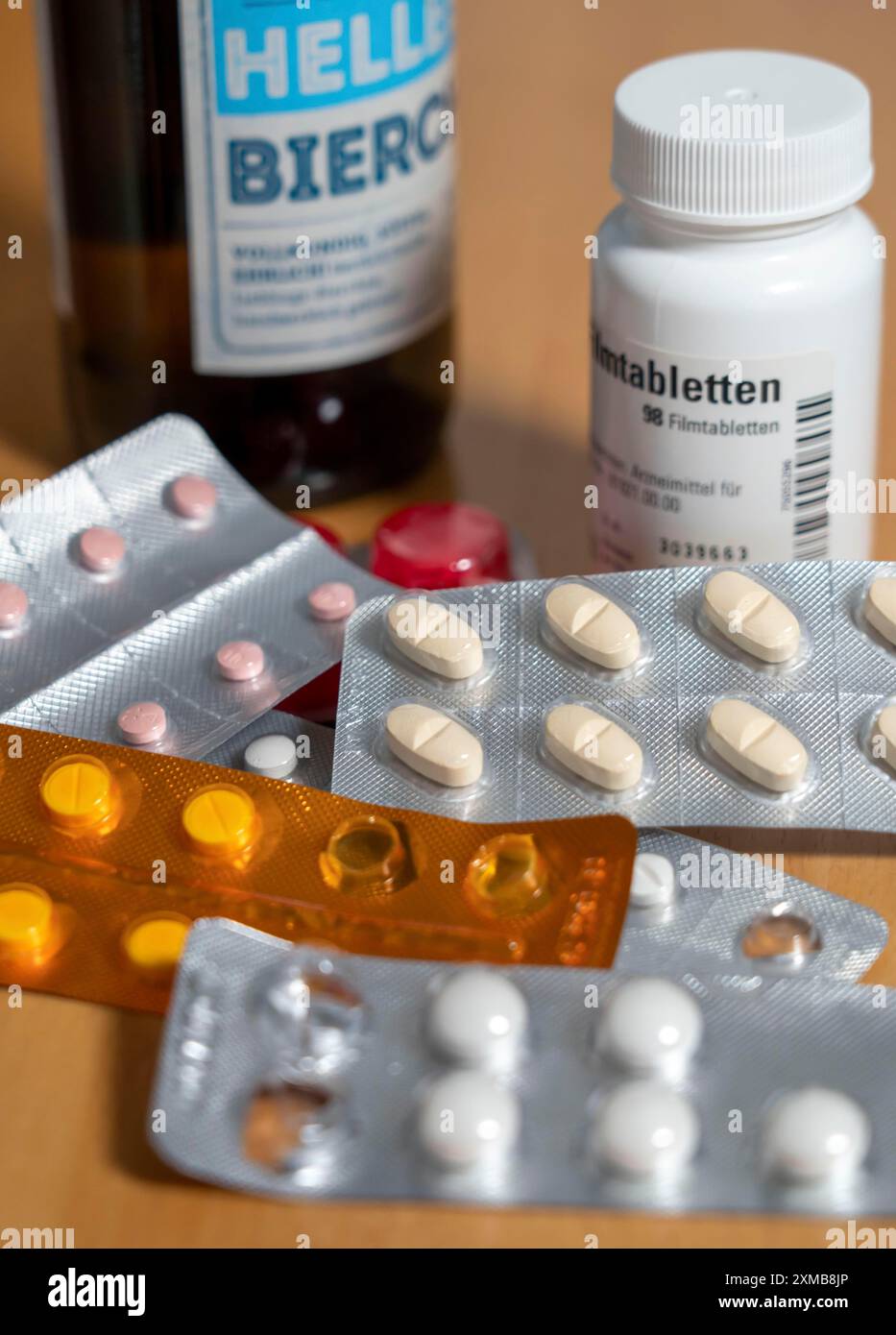 Symbolic image of alcohol and medication, you should not take medicine ...