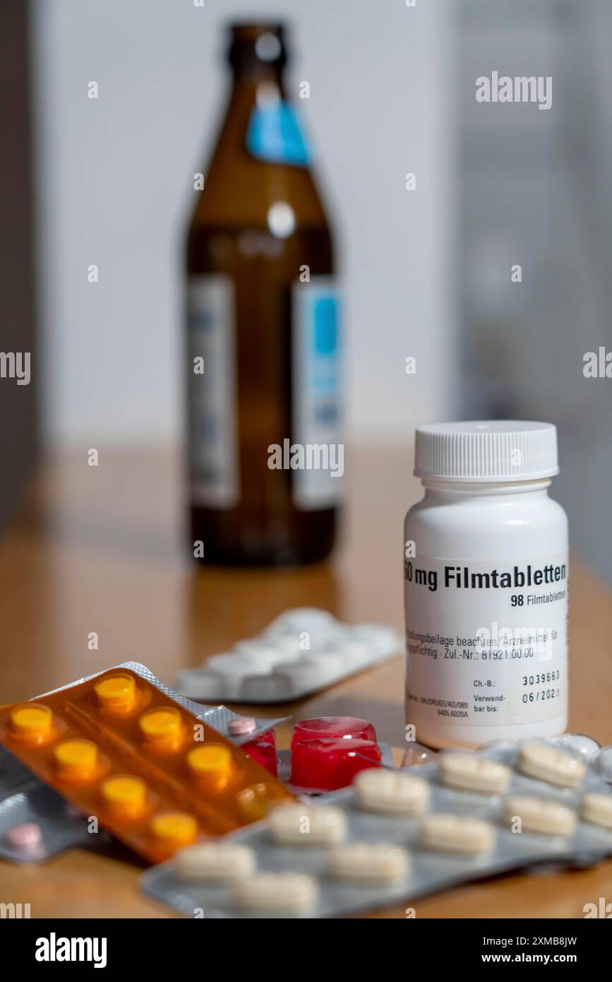 Symbolic image, taking medication and alcohol, should not be done ...