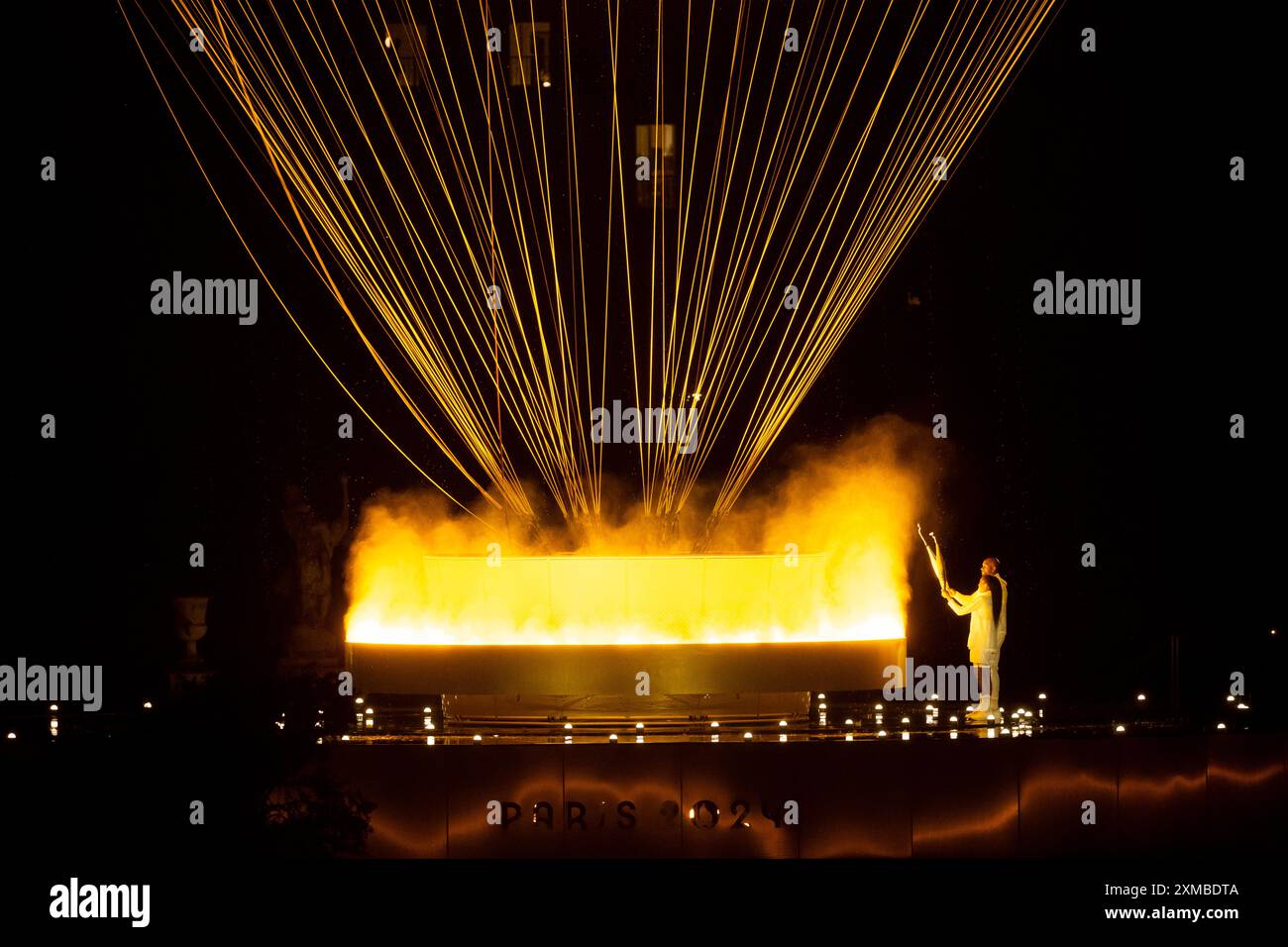 Paris, France. 26th July, 2024. The lighting of the Olympic flame at ...