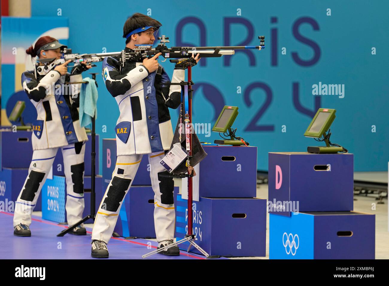 Islam Satpayev, right, and Alexandra Le of Kazakhstan compete for the ...