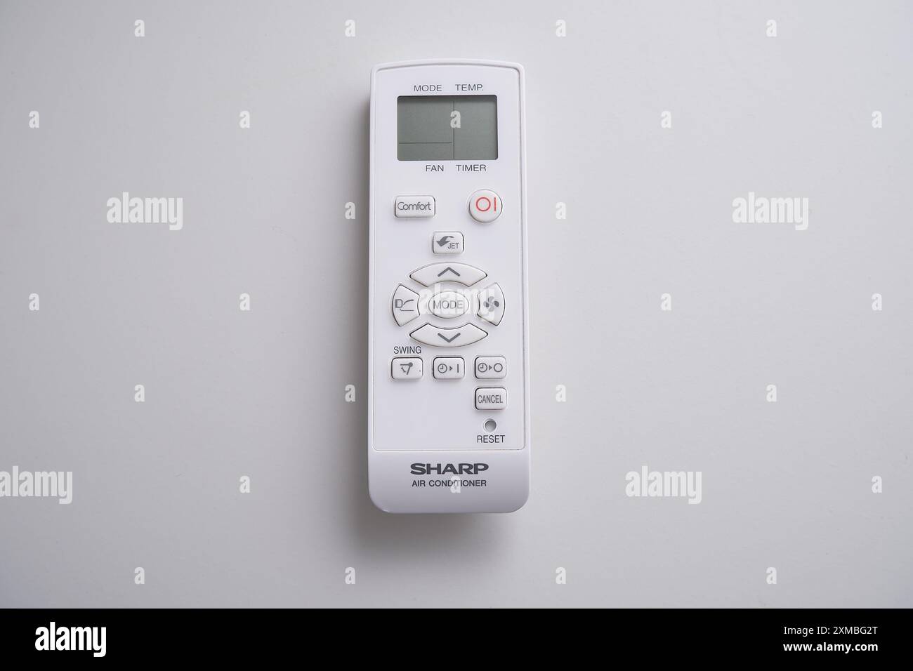A White Sharp Air Conditioner Ac Remote Controller With Lcd Screen