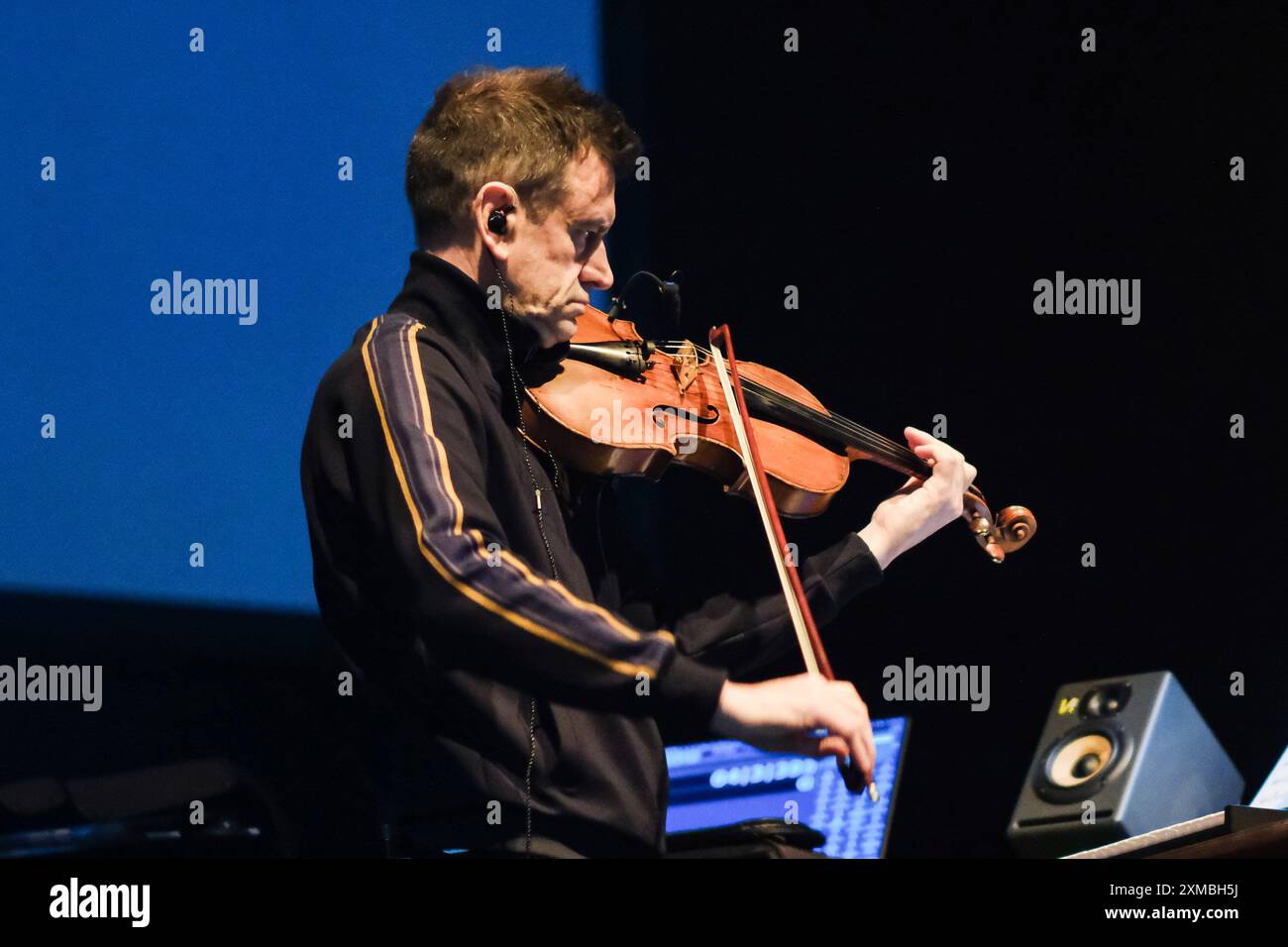 Malmesbury, UK. 26th July, 2024. John Metcalfe performs on the Siam ...