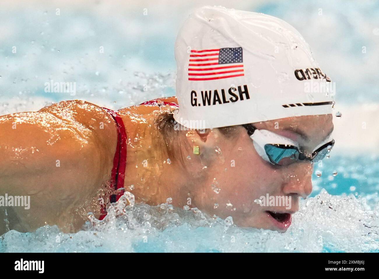 Gretchen Walsh, of the United States, competes during a heat in the ...