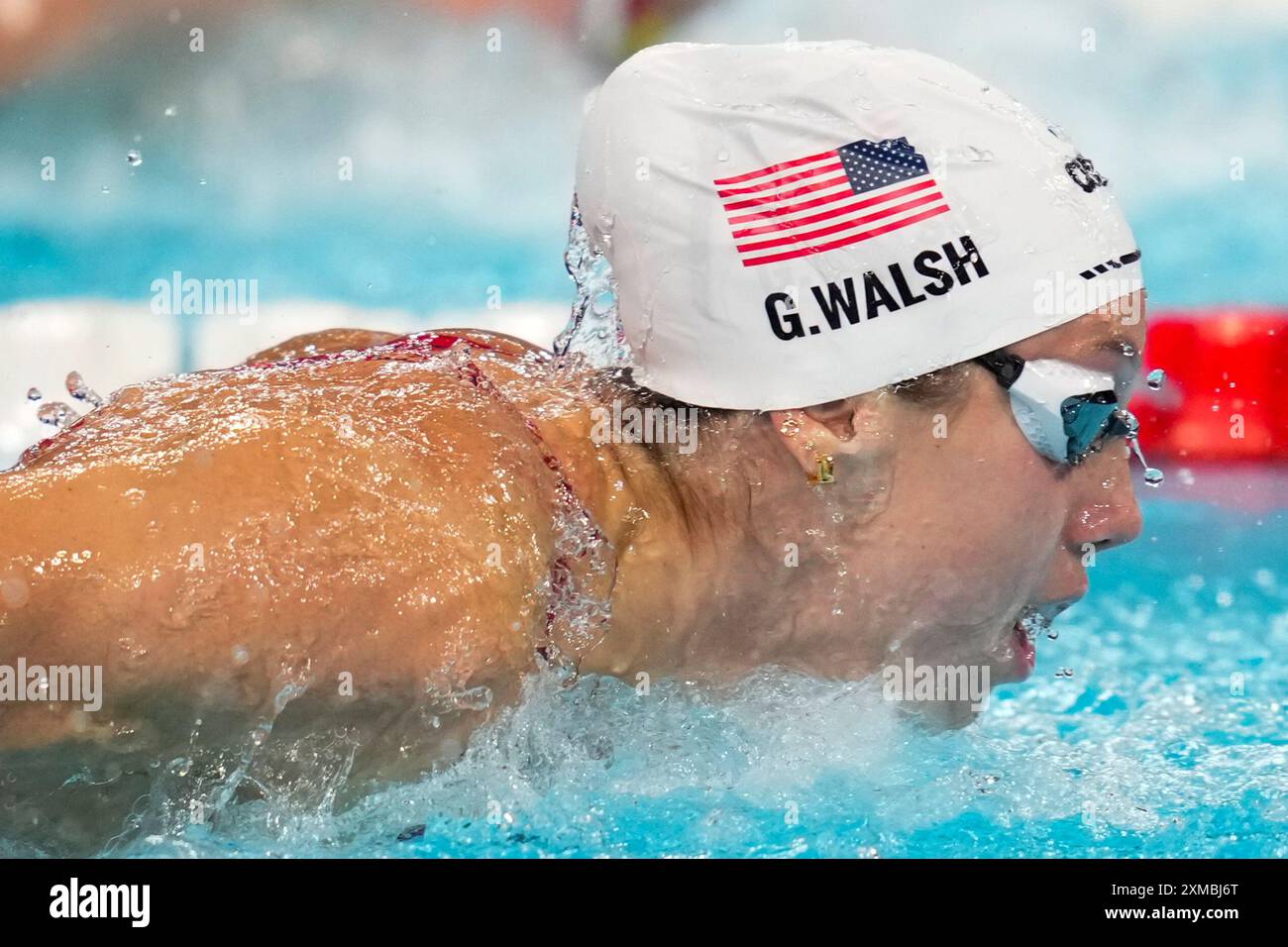 Gretchen Walsh, of the United States, competes during a heat in the ...