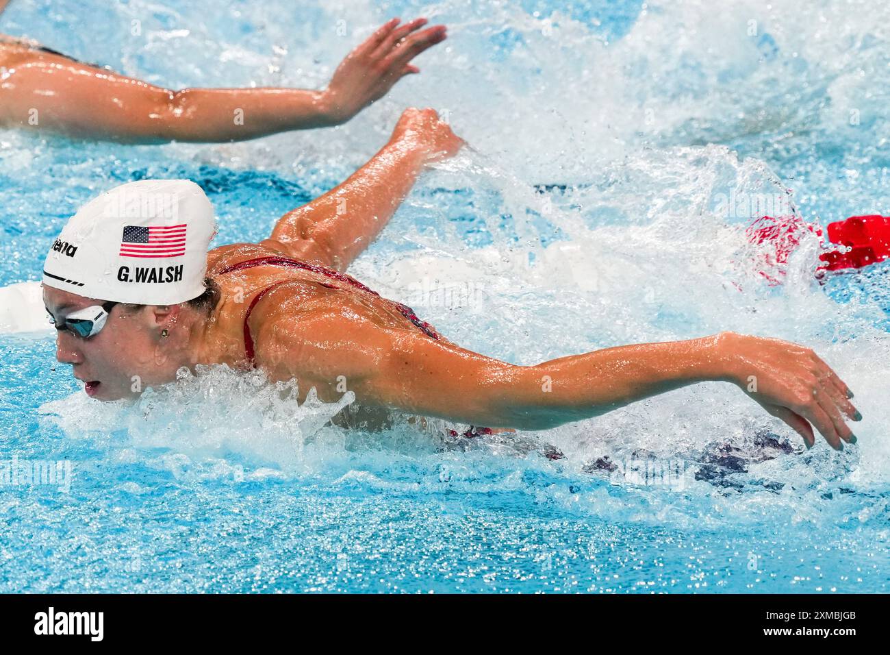 Gretchen Walsh, of the United States, competes during a heat in the ...