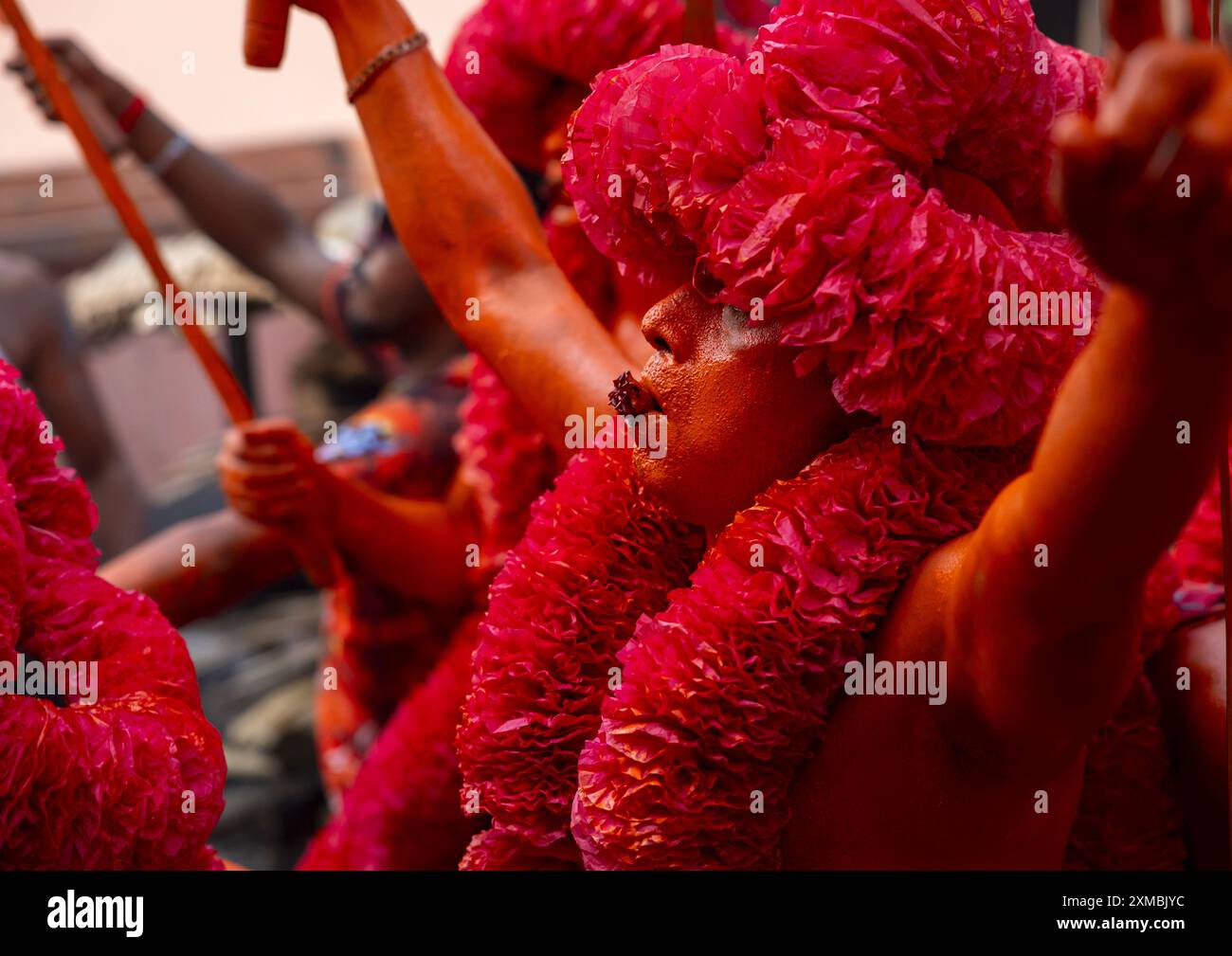 Hindu devotees covered with orange color in Lal Kach festival, Dhaka ...
