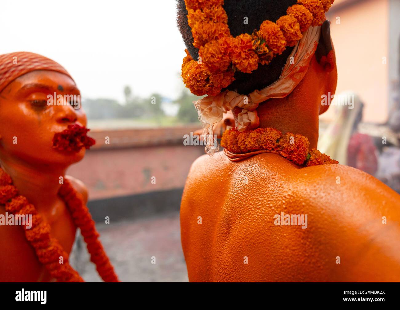 Hindu devotees covered with orange color in Lal Kach festival, Dhaka ...