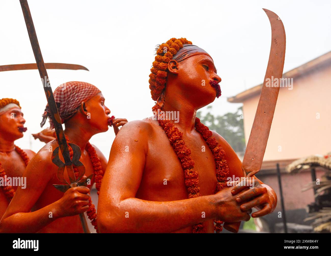 Hindu devotees covered with orange color in Lal Kach festival, Dhaka ...