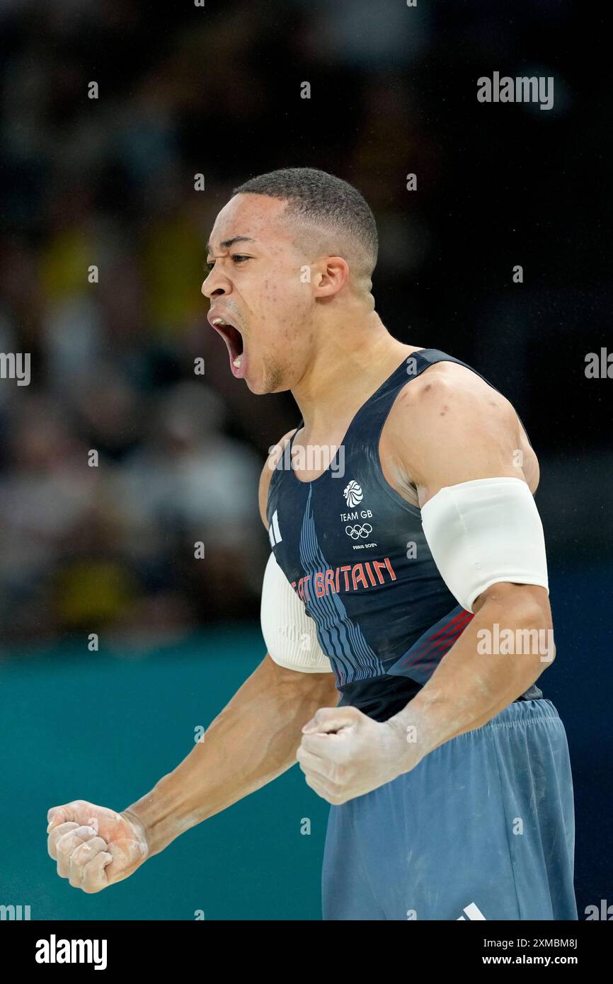 Joe Fraser, of Great Britain, celebrates after competing on the ...