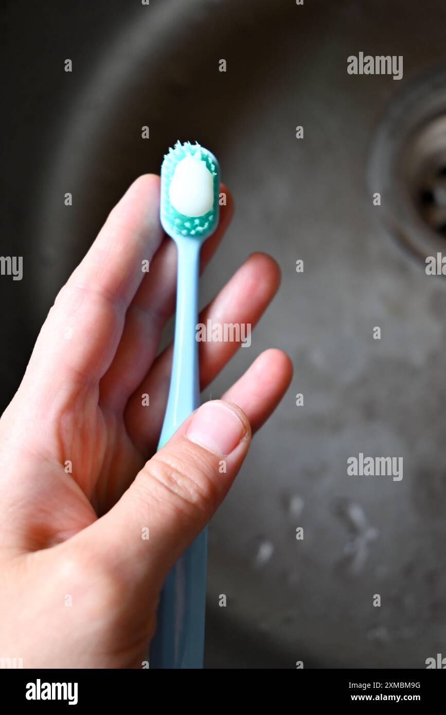 Toothbrush in drops water hi-res stock photography and images - Alamy