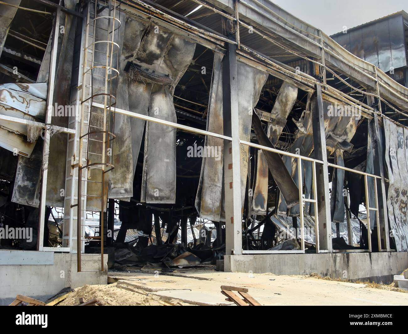 Aftermath of a fire at a construction site, showcasing significant ...