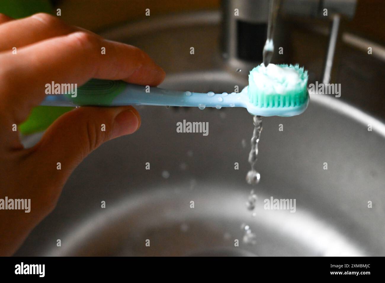 Toothbrush in drops water hi-res stock photography and images - Alamy