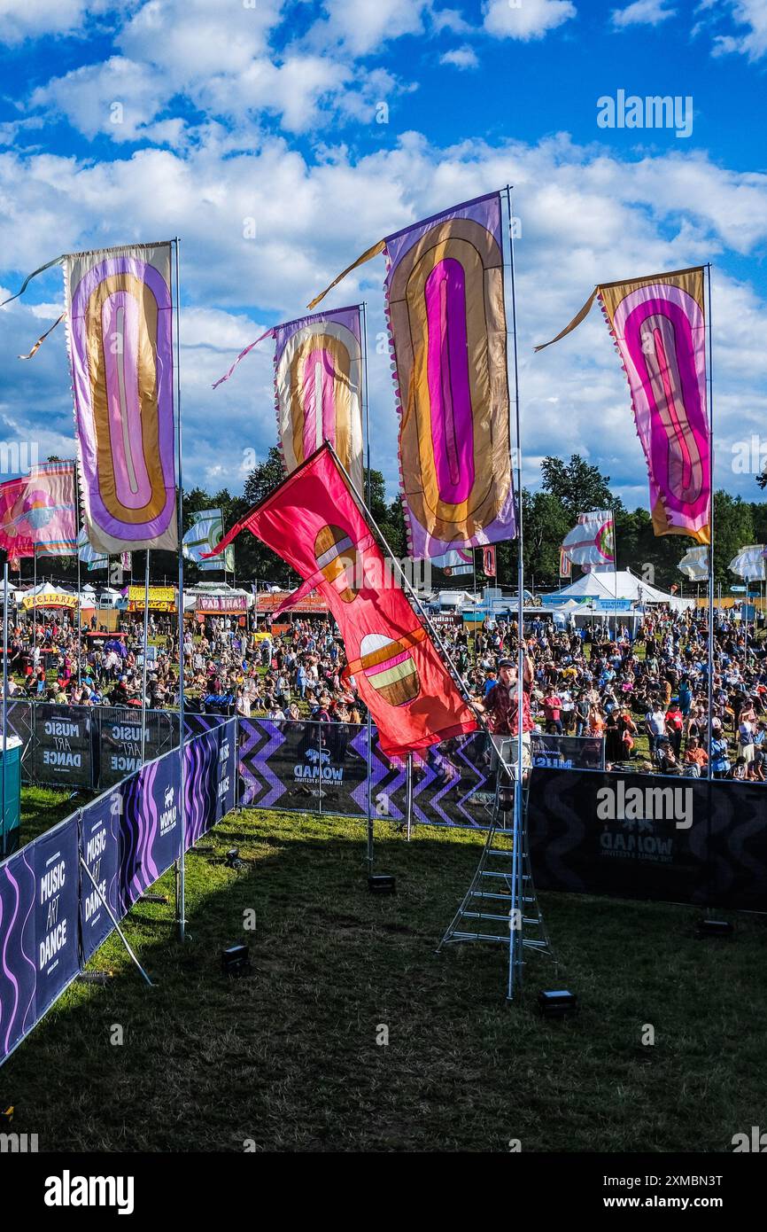 Malmesbury, UK. 26 July 2024. Angus Watt photographed during Womad ...