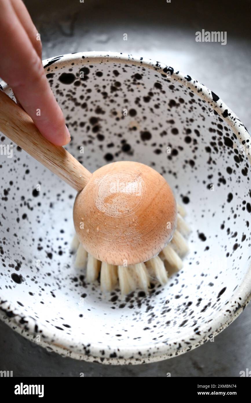 washing dishes with foam Stock Photo - Alamy